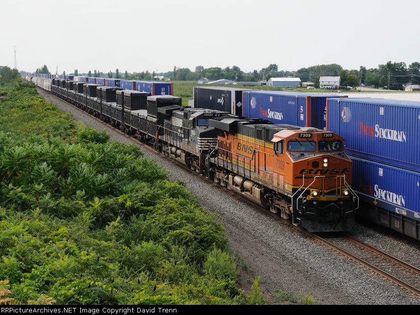 BNSF 7309 leads Eastbound CSX Q380 at MP 70